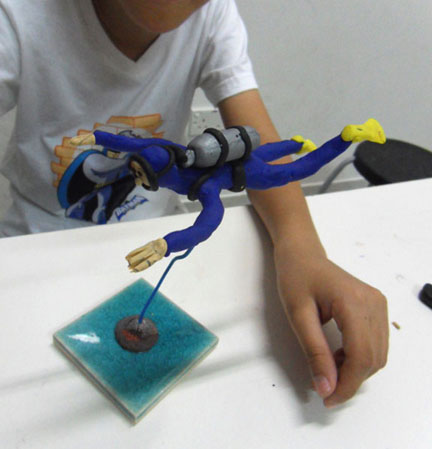 The Clay Story By Garie Sim, The Clay Figurine